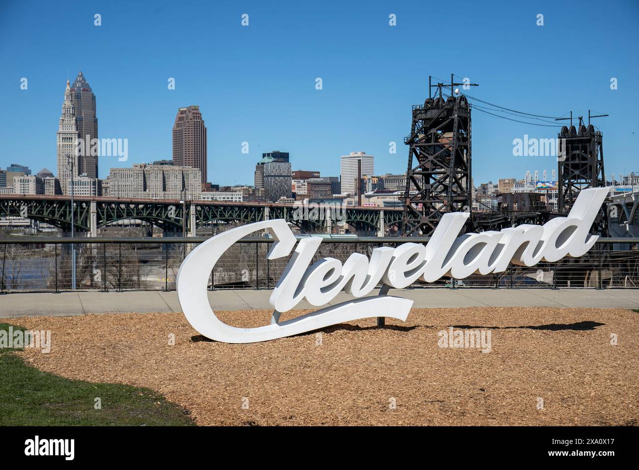The iconic white Cleveland sign by industrial structures Stock Photo ...