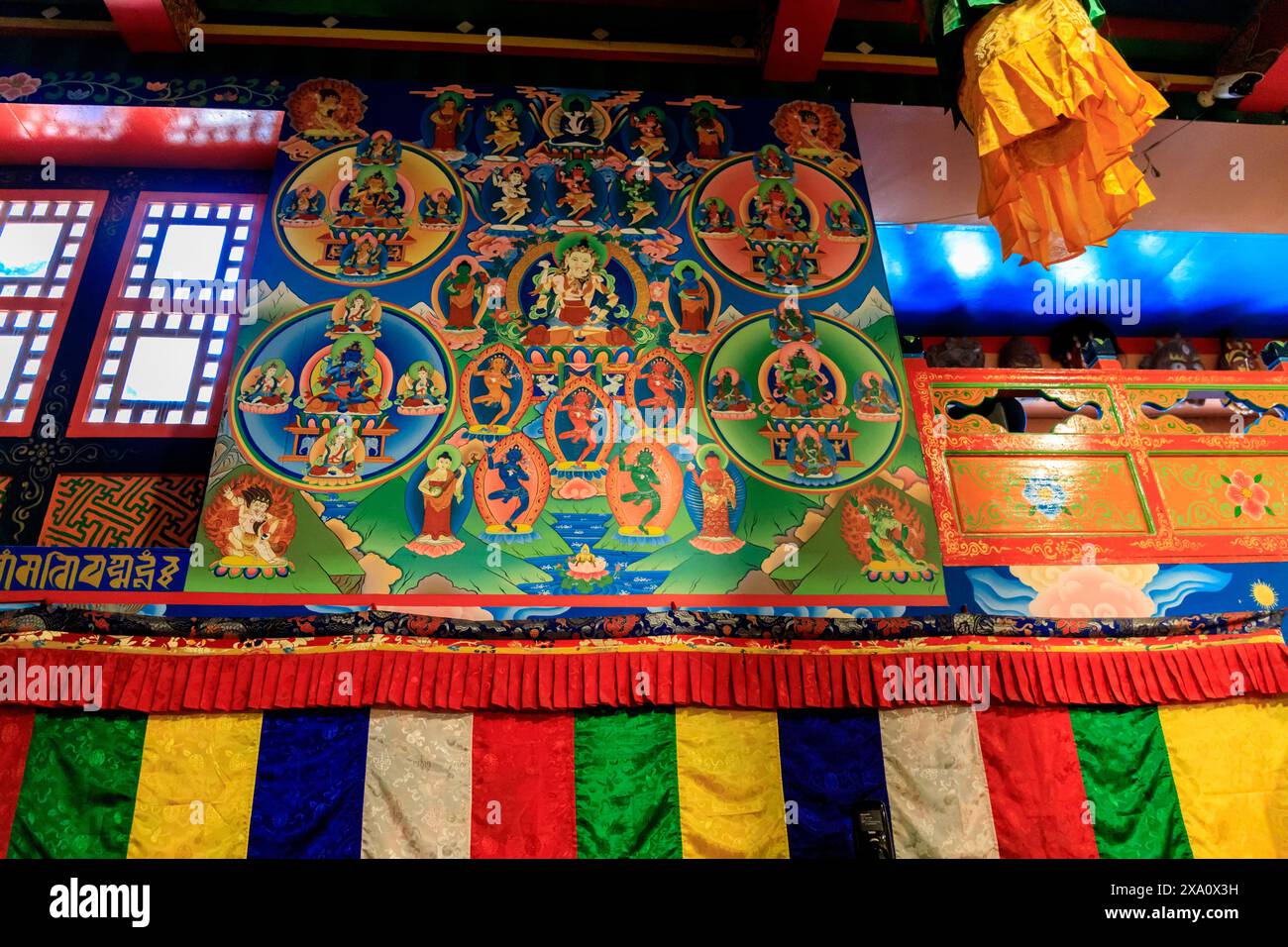 Buddhist temple interior featuring ornate decorations, statues of ...