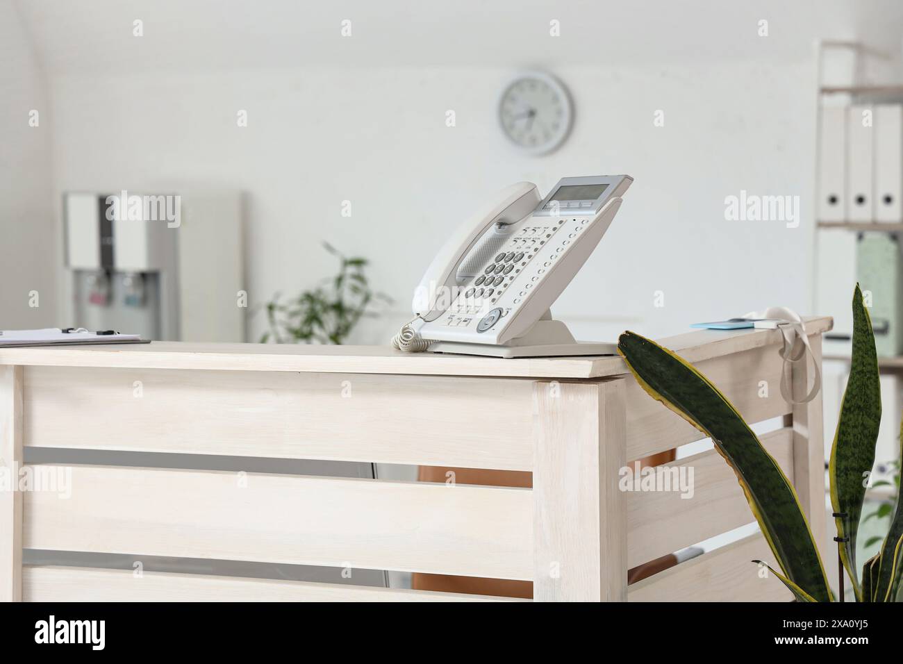 Telephone on reception desk in clinic, closeup Stock Photo - Alamy