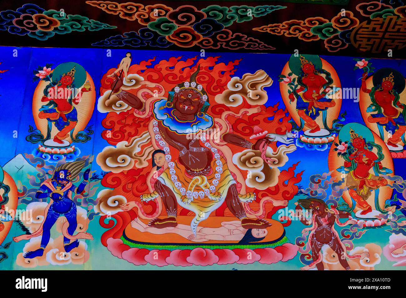 Buddhist temple interior featuring ornate decorations, statues of ...