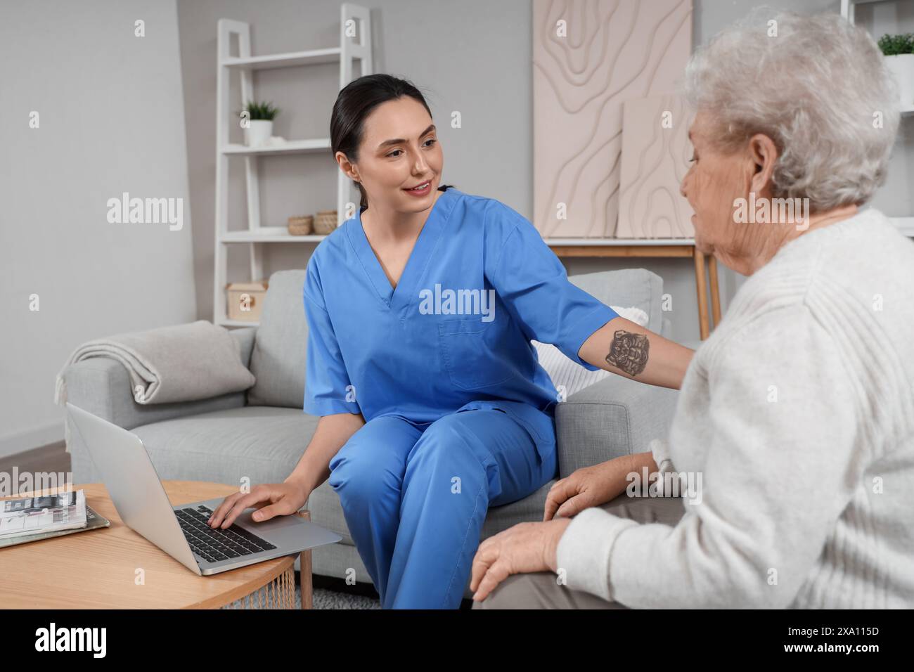 Physical therapist with computer hi-res stock photography and images ...
