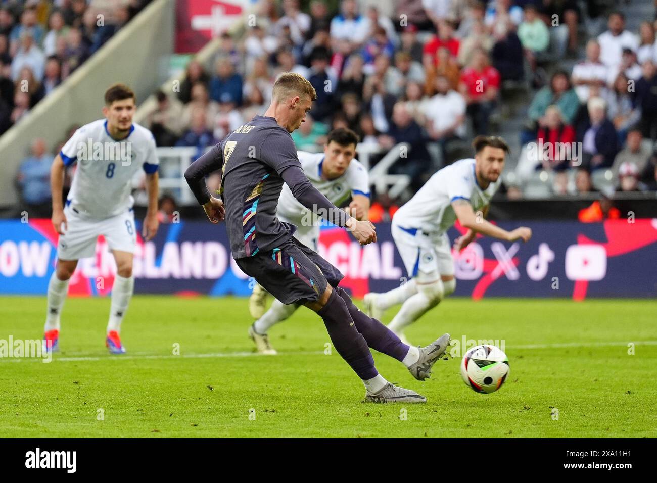 England's Cole Palmer scores the opening goal of the game from a ...