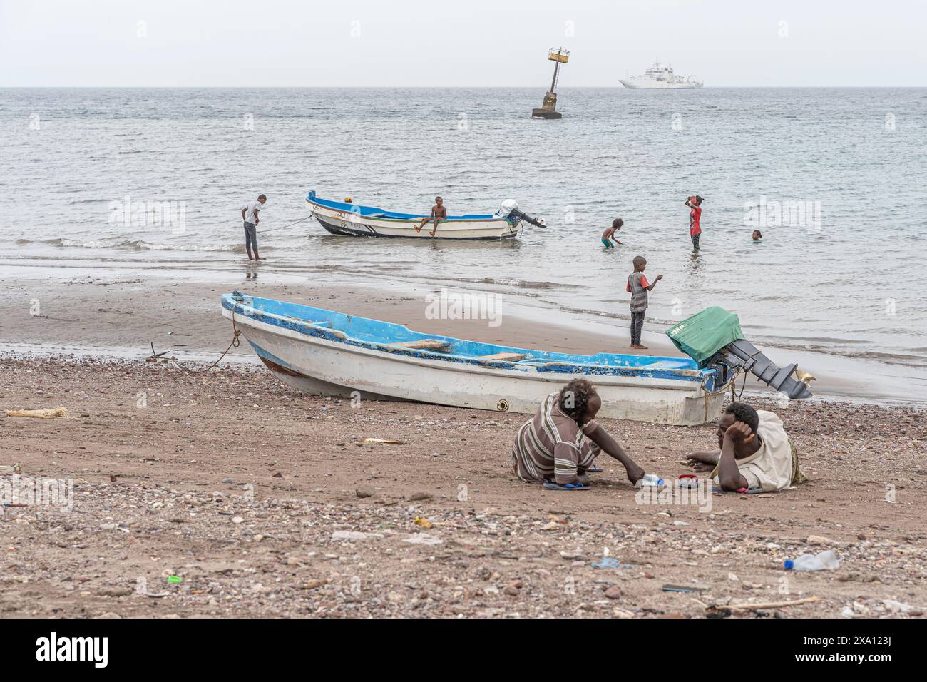 Waterfront of Tadjoura with beach, boats and people, Republic of ...