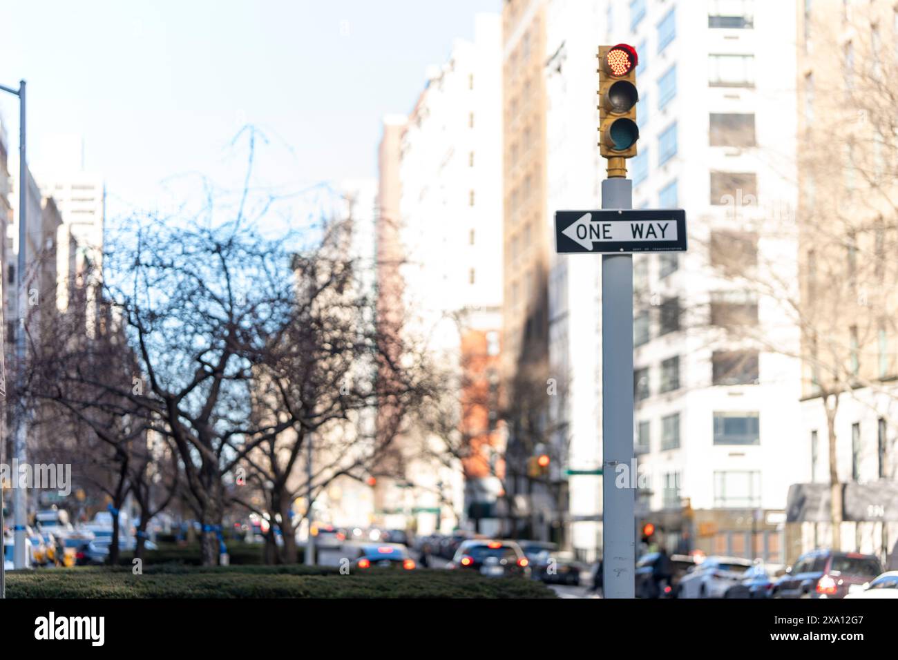 A New York City street with traffic lights and one way sign Stock Photo ...