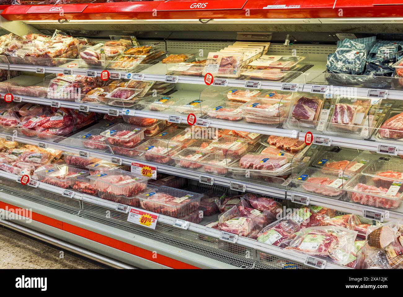 Wide view of packaged meat products displayed in the refrigerated ...