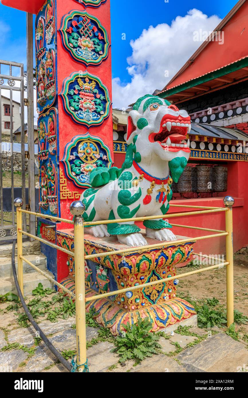 Buddhist temple interior featuring ornate decorations, statues of ...