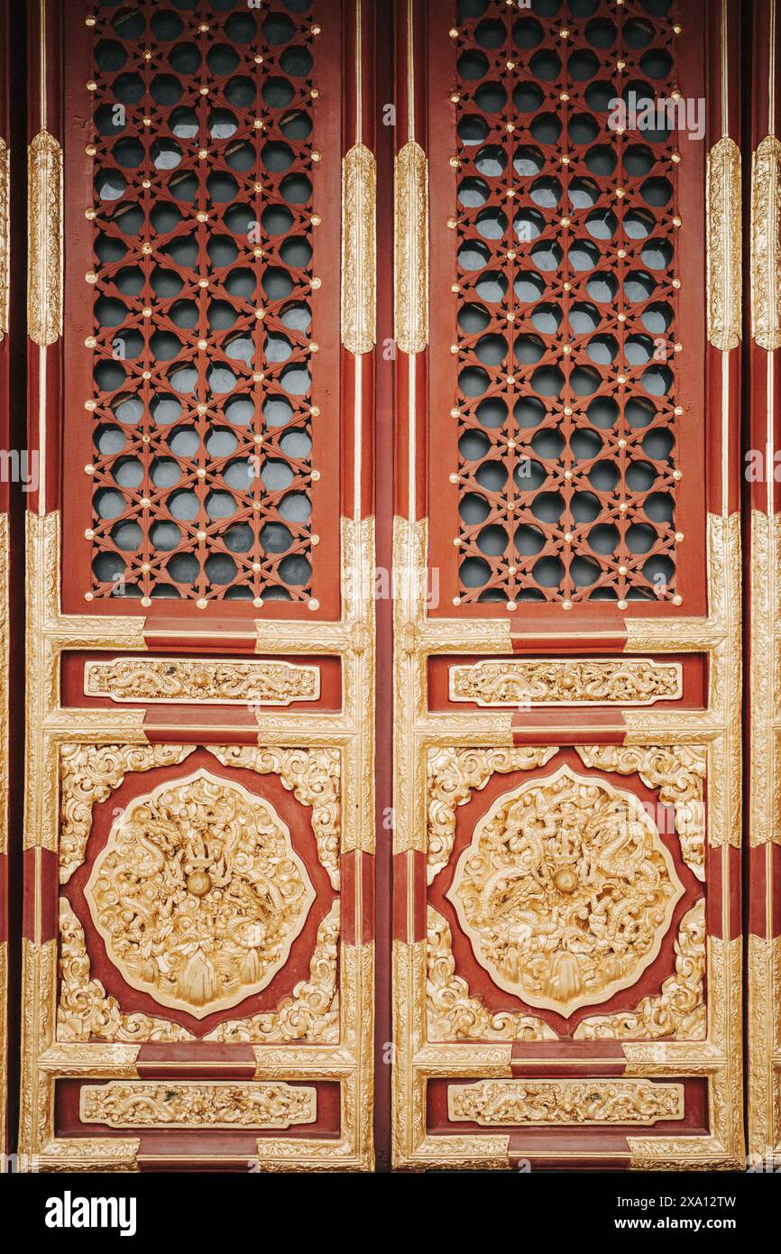 The tightly closed palace gates within the Forbidden City, with ...