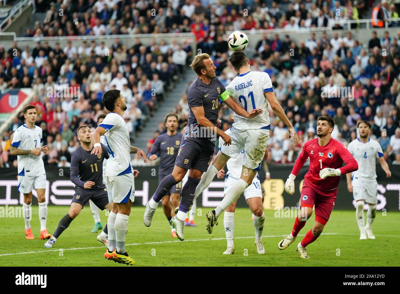 England's Harry Kane (centre) attempts a header on goal during an ...