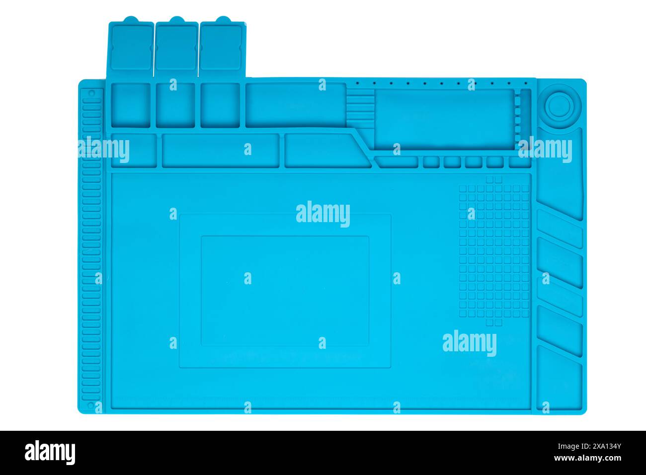 A blue silicone work mat with compartments for tools and components ...