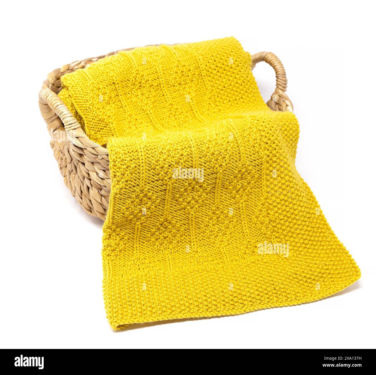 photography of a yellow knitted blanket in diamond knitting pattern in ...