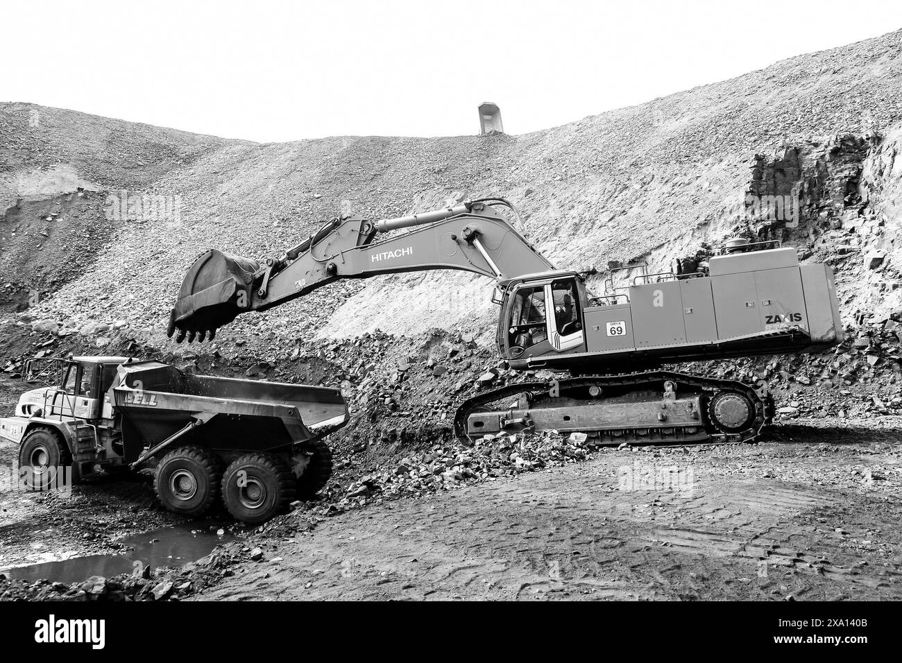 Vintage truck and excavator digging dirt on rural hillside Stock Photo ...