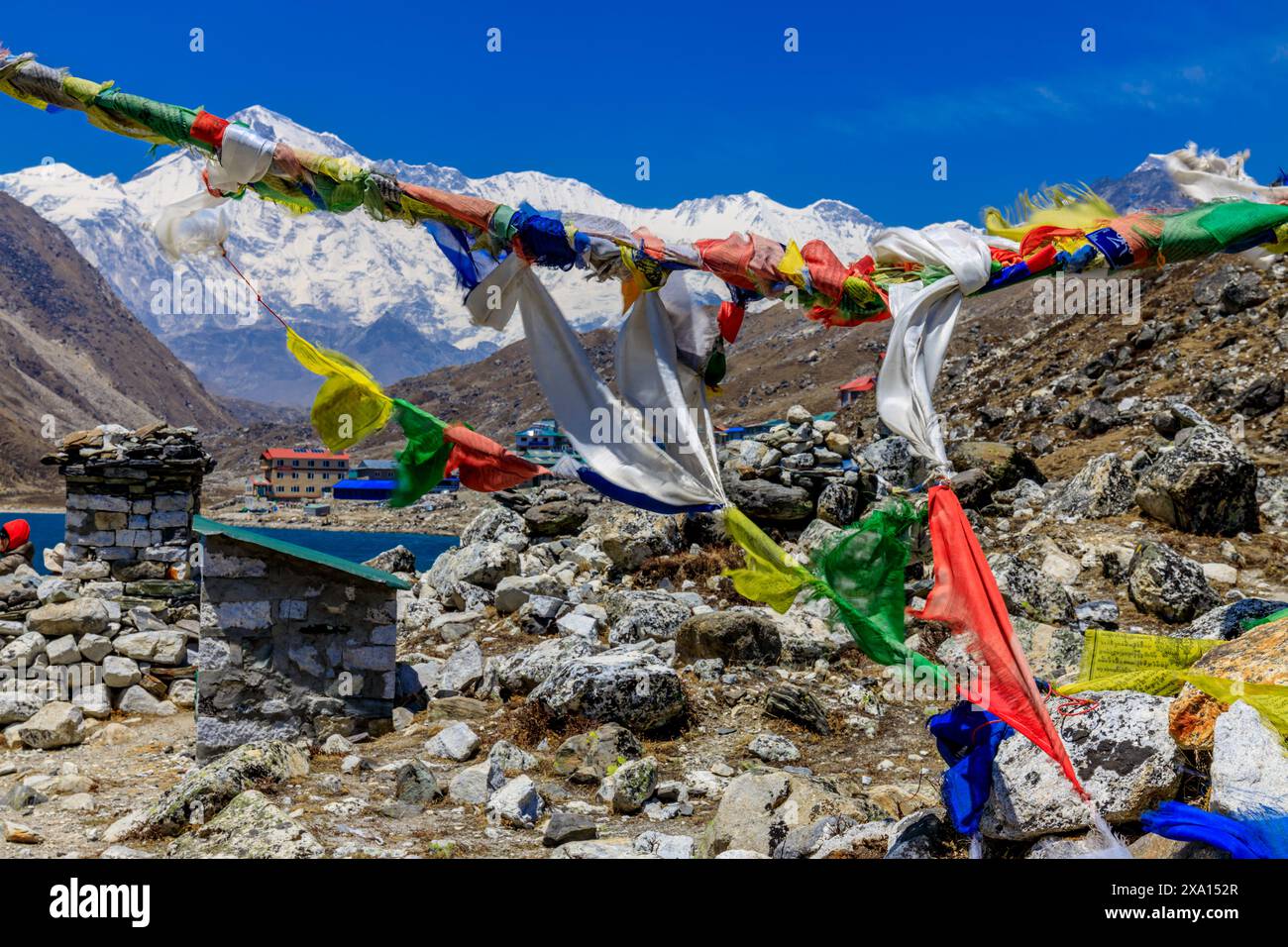 Colorful Nepali and Tibetan prayer flags fluttering in the majestic ...