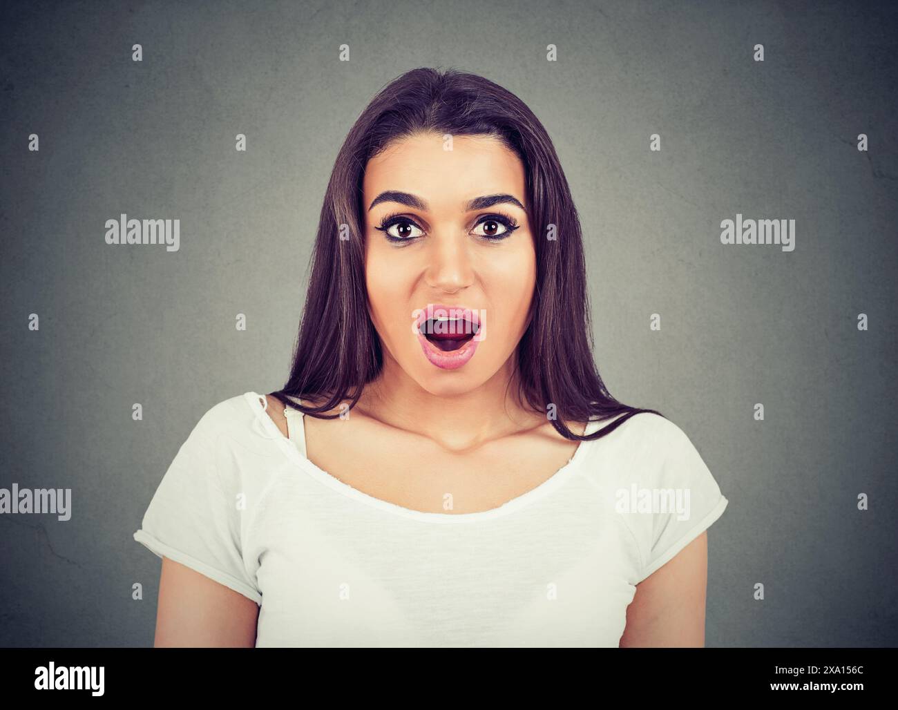 Surprise astonished woman. Closeup portrait woman looking surprised in full disbelief wide open ...