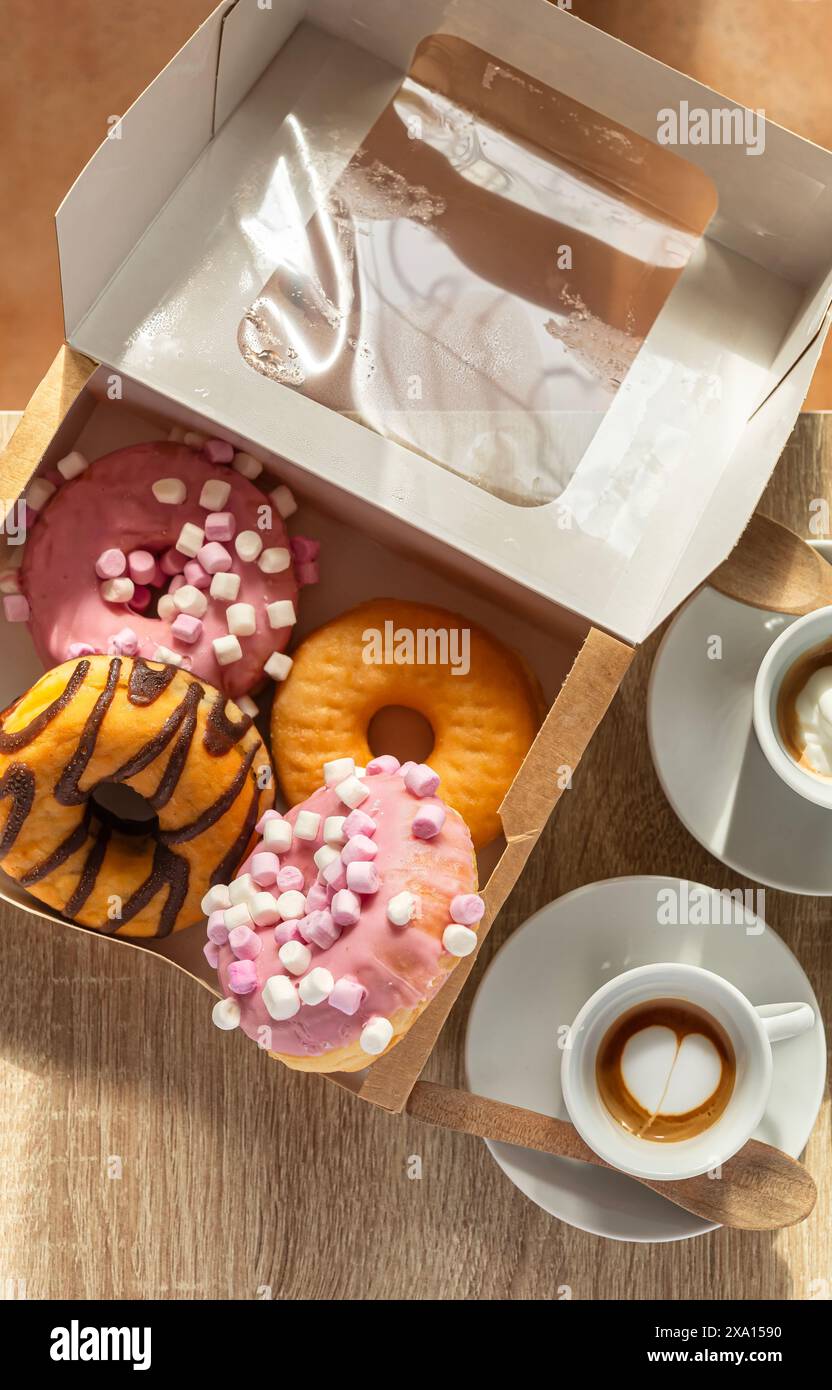 Top view of a breakfast or snack with donuts and coffee, doughnuts day ...