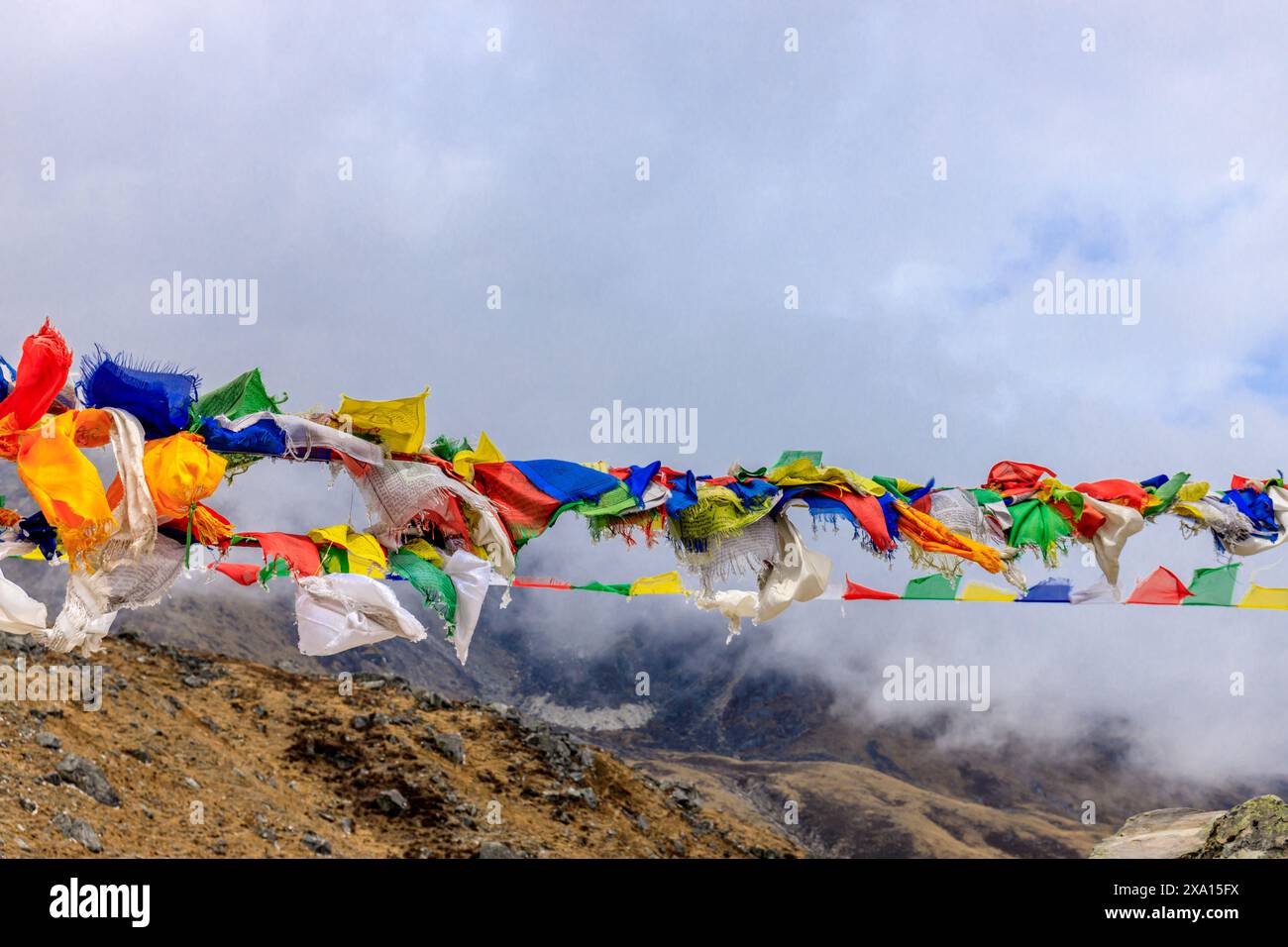 Colorful Nepali and Tibetan prayer flags fluttering in the majestic ...