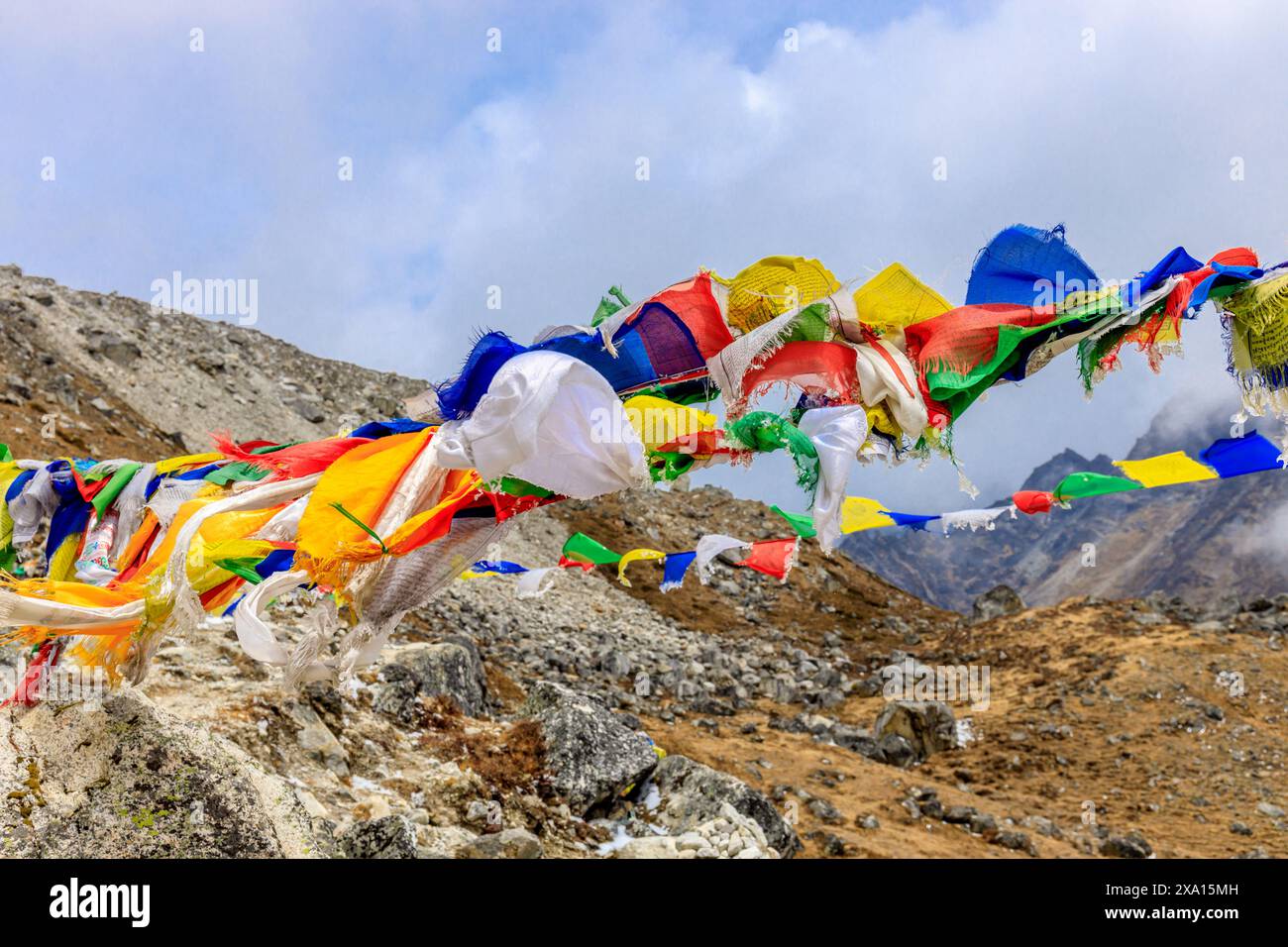 Colorful Nepali and Tibetan prayer flags fluttering in the majestic ...
