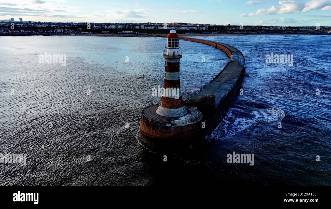 An aerial view of a lighthouse at the edge of a pier Stock Photo - Alamy