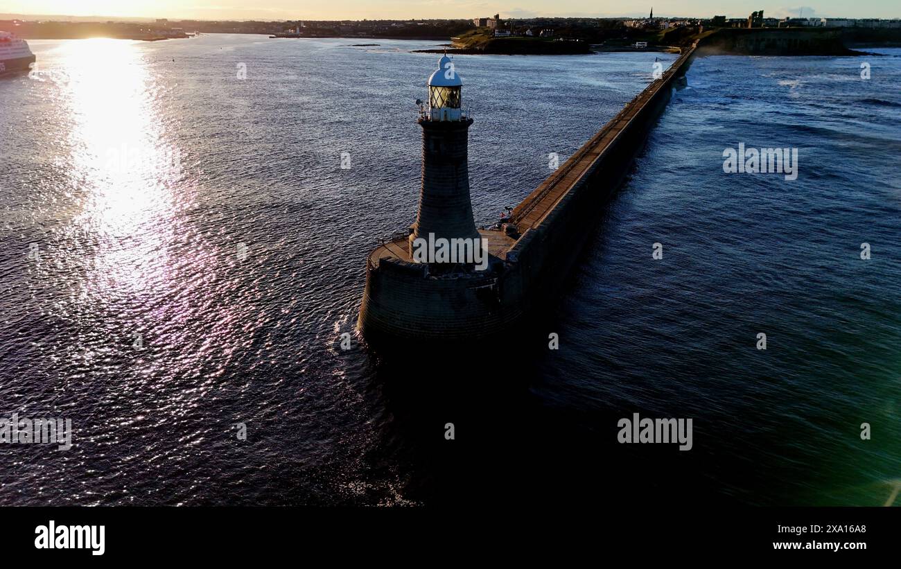 An aerial view of a lighthouse at the edge of a pier Stock Photo - Alamy