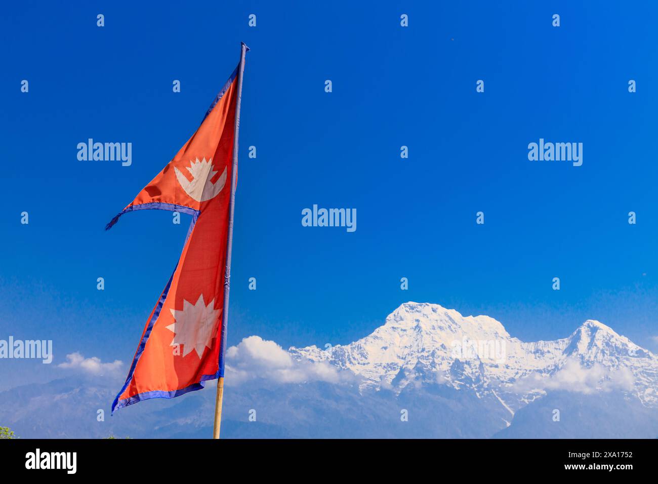 Colorful Nepali and Tibetan prayer flags fluttering in the majestic ...