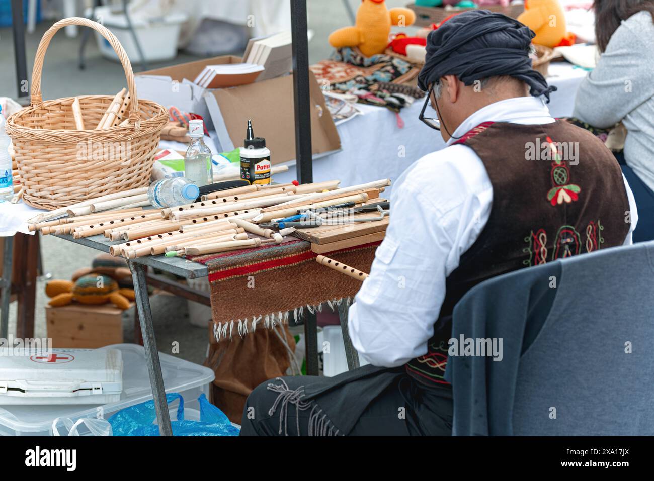 Dierona, Limassol District, Cyprus - March 12, 2023: Artisan in ethnic ...