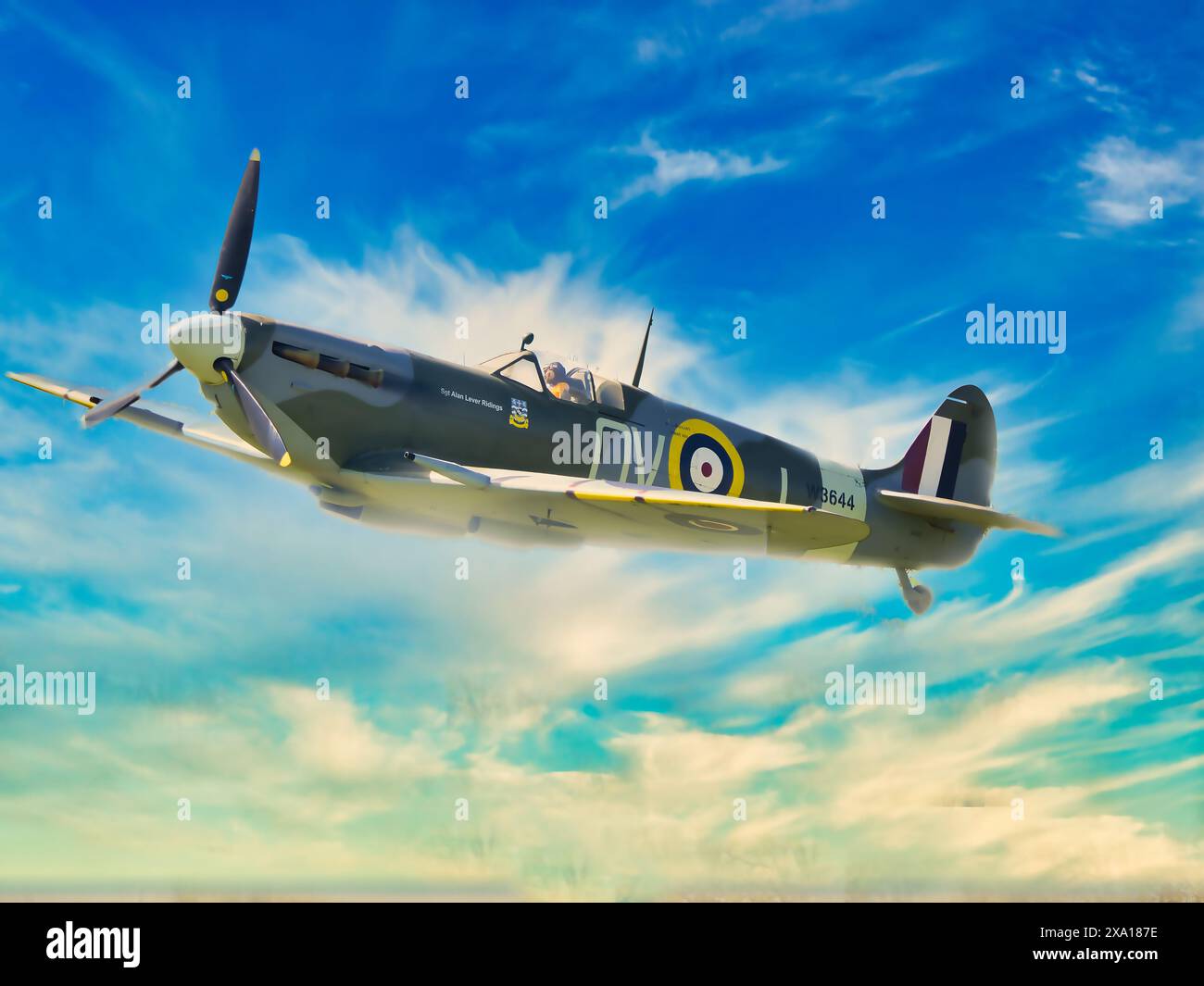 WW2 Supermarine Spitfire climbing in blue sky Stock Photo - Alamy