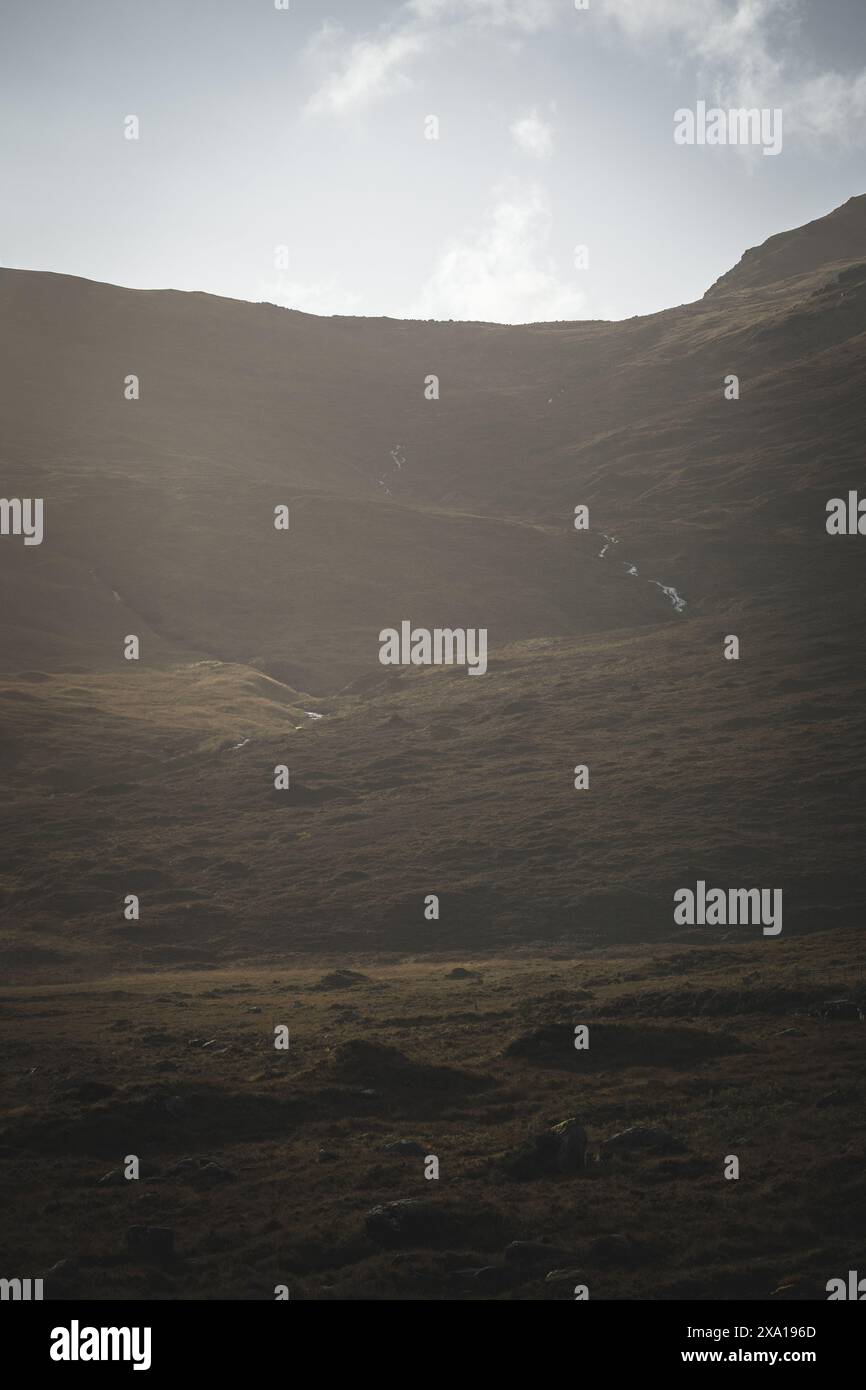 The Sun shining through the clouds at Isle of Skye, Scotland Stock ...