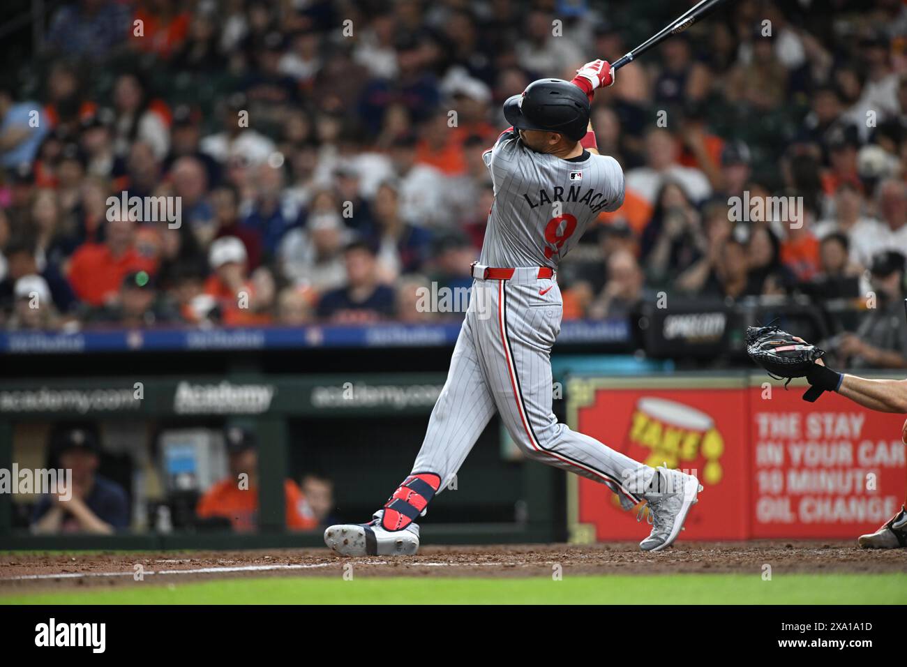 Minnesota Twins outfielder Trevor Larnach (9) hits a 2-run homer in the ...