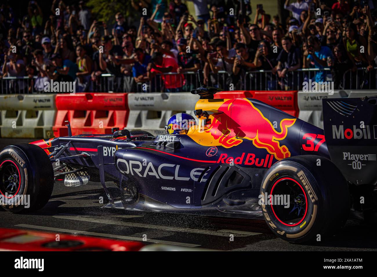 Race car driving on track with crowd hi-res stock photography and ...