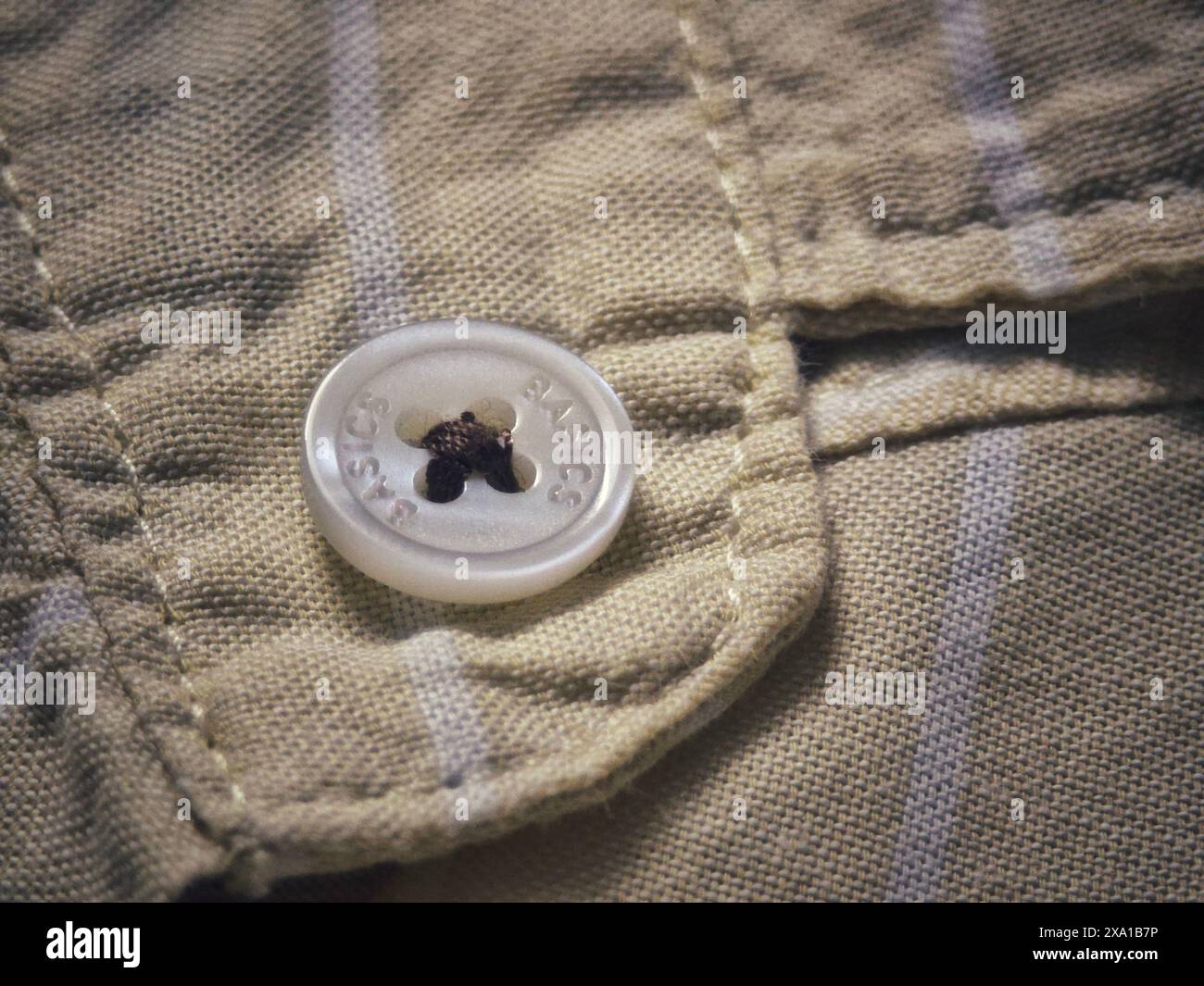 A button in the back pocket of pants Stock Photo - Alamy