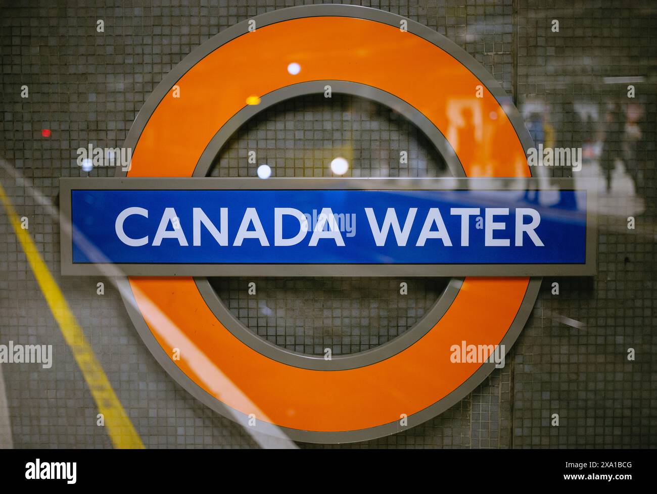 A double exposure in camera of a TFL sign showing ''Canada Water ...