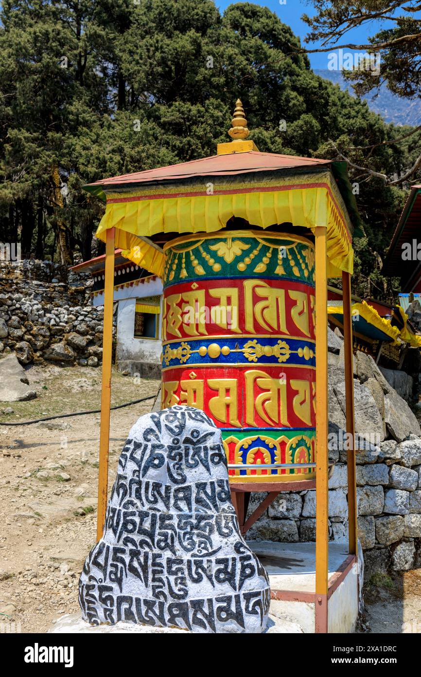 Nepal sacred stones mani with mantra written and carved on the surface ...