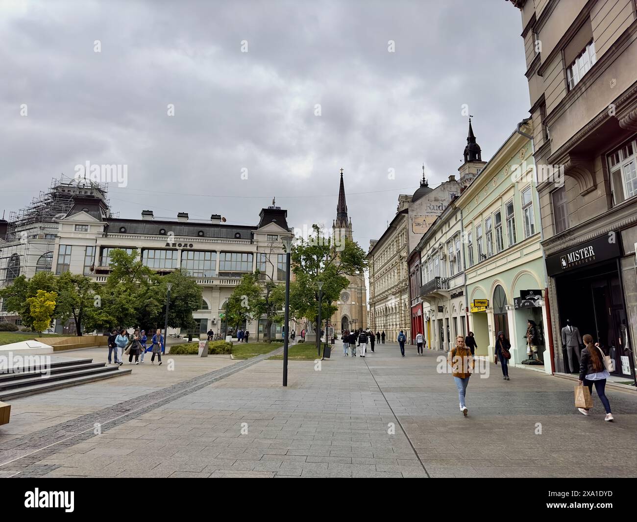 The people on the street in Novi Sad surrounded by historical buildings ...