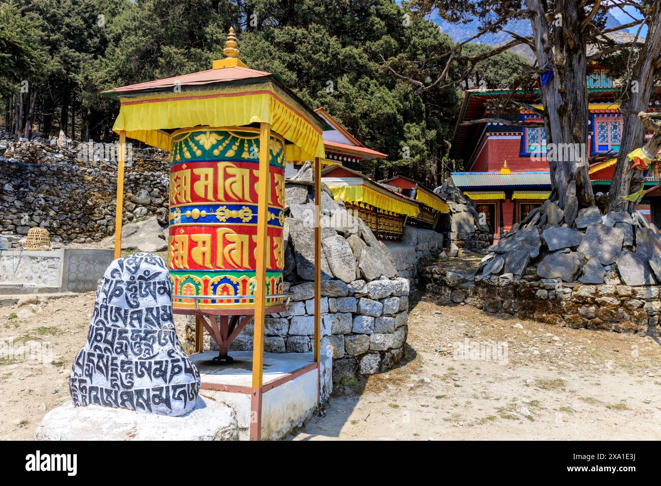Nepal sacred stones mani with mantra written and carved on the surface ...