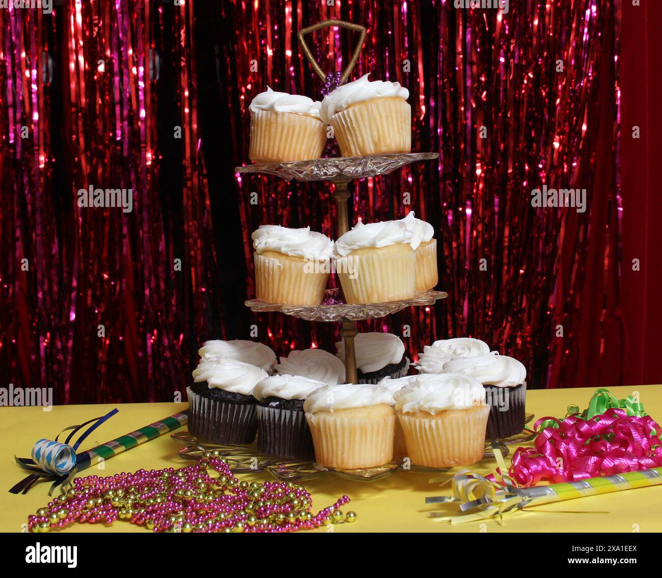 The cupcakes displayed against shiny red ribbons Stock Photo - Alamy