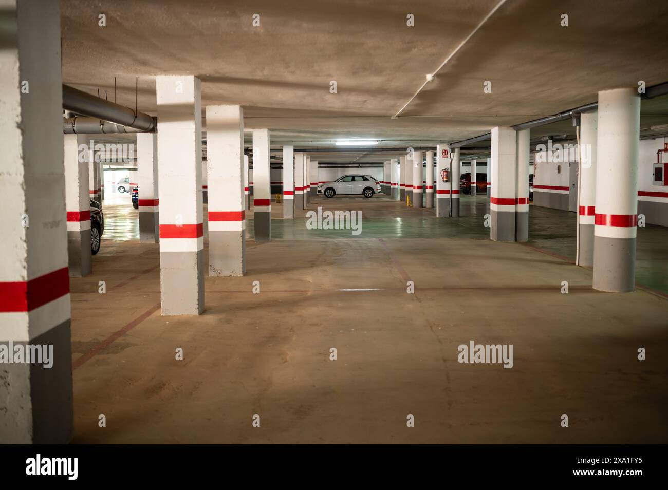 Interior of almost empty parking Stock Photo - Alamy