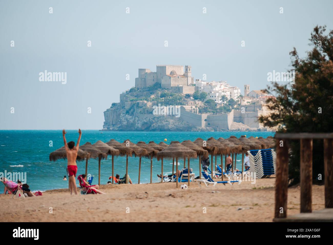 View of Papa Luna castle in Peñiscola from the beach, Castellon ...
