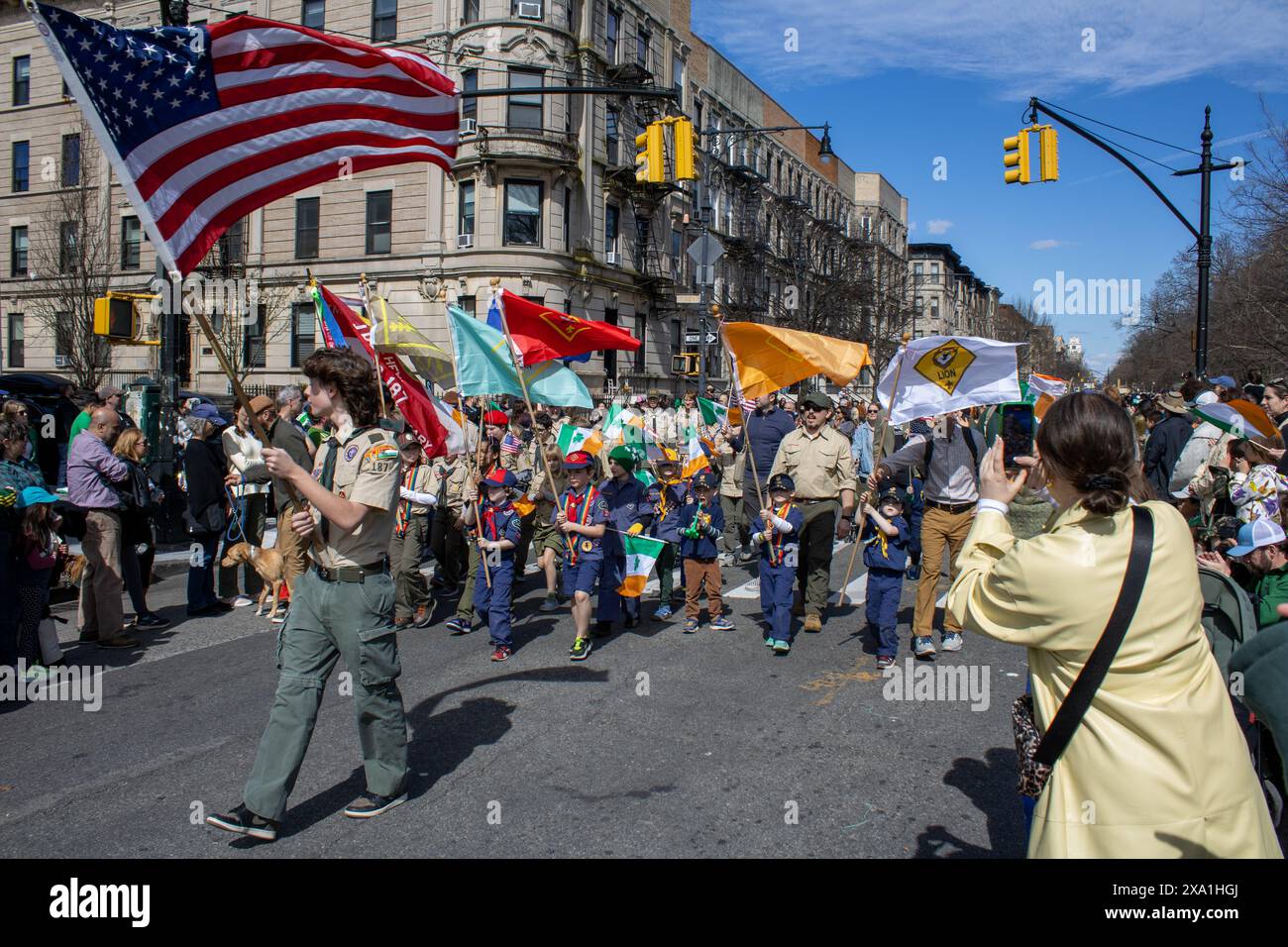 A bustling street parade with a big crowd gathered in New York, United ...