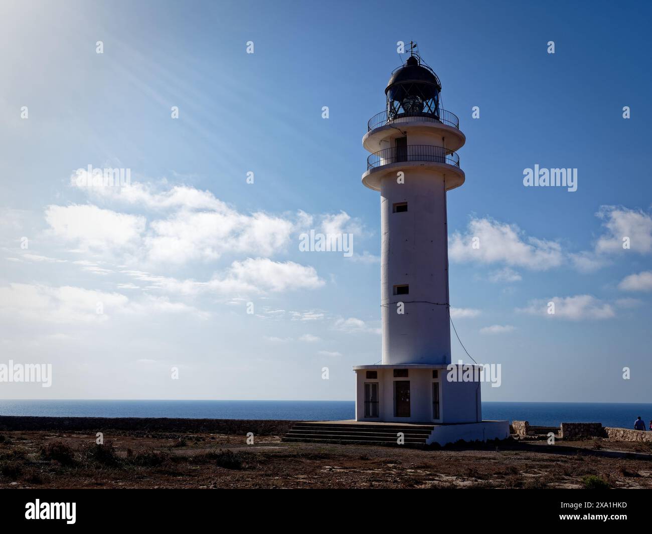 The iconic Cap de Barbaria lighthouse in Formentera, Spain Stock Photo ...
