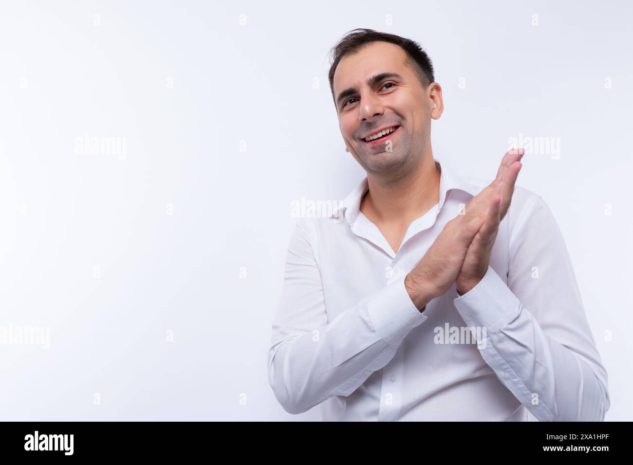 European 40 year old man dressed in a shirt has a positive attitude and ...