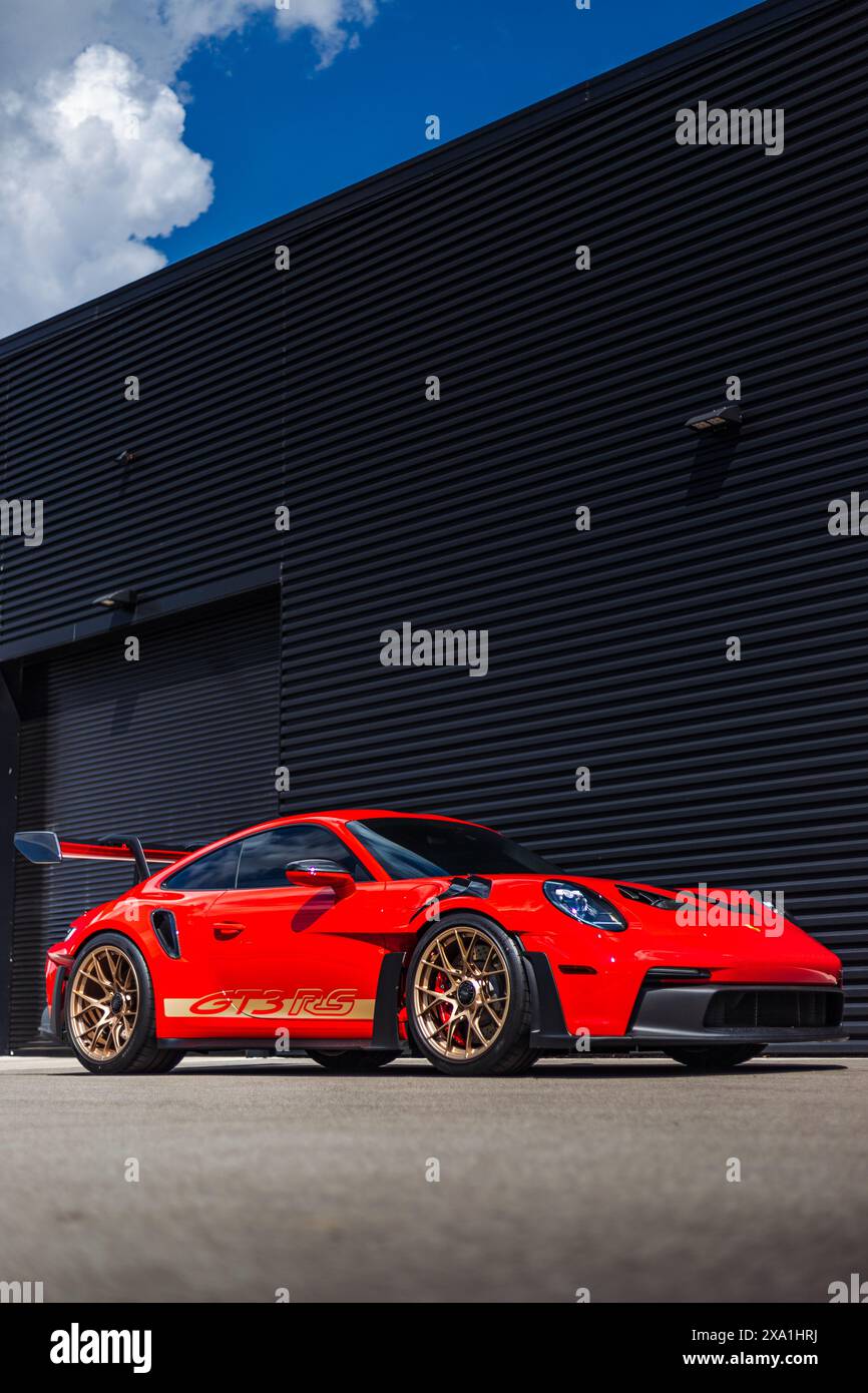 A stunning Guards Red 992 Porsche GT3 RS with Aurum Gold wheels Stock ...