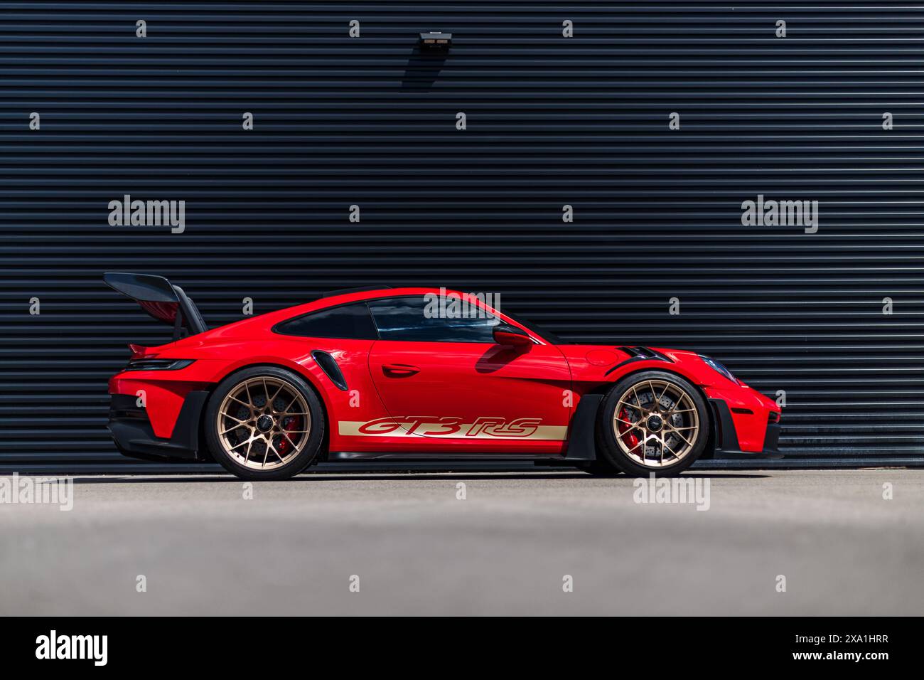 A stunning Guards Red 992 Porsche GT3 RS with Aurum Gold wheels Stock ...