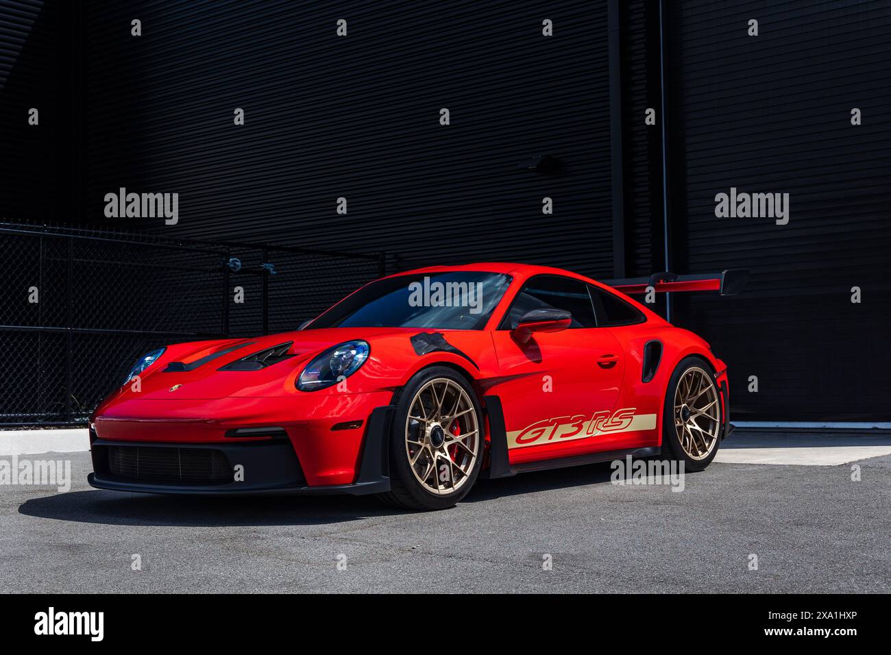 A stunning Guards Red 992 Porsche GT3 RS with Aurum Gold wheels Stock ...
