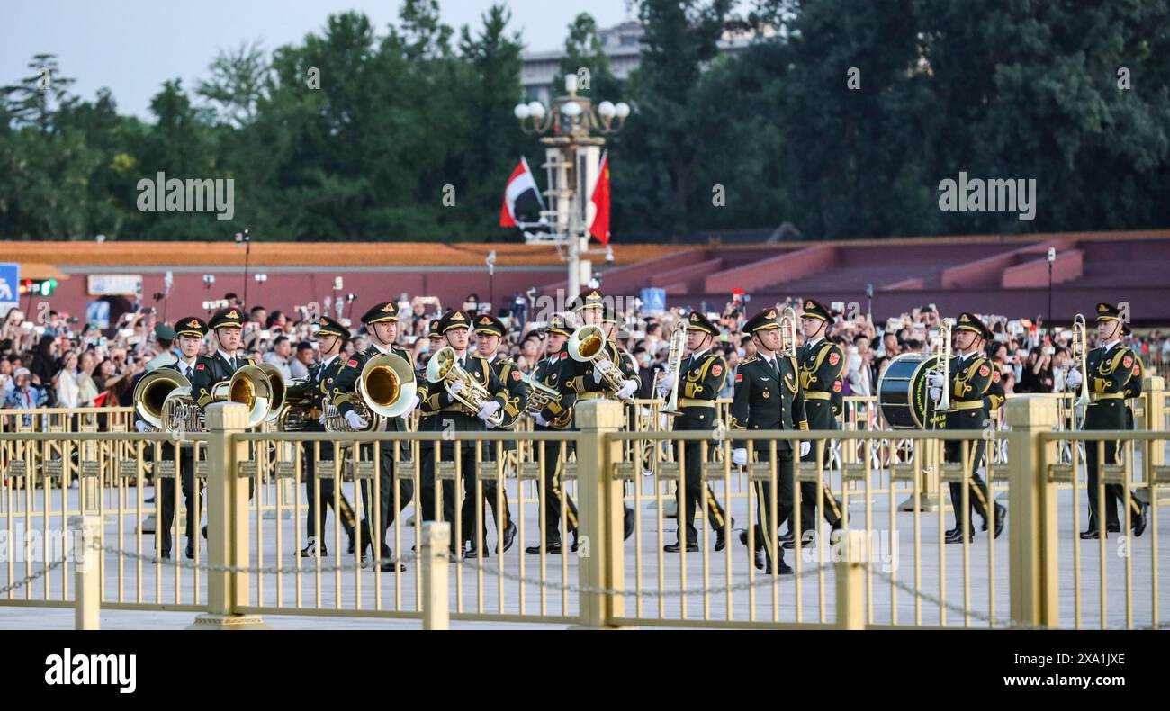 BEIJING, CHINA - JUNE 1, 2024 - A national flag raising ceremony at ...
