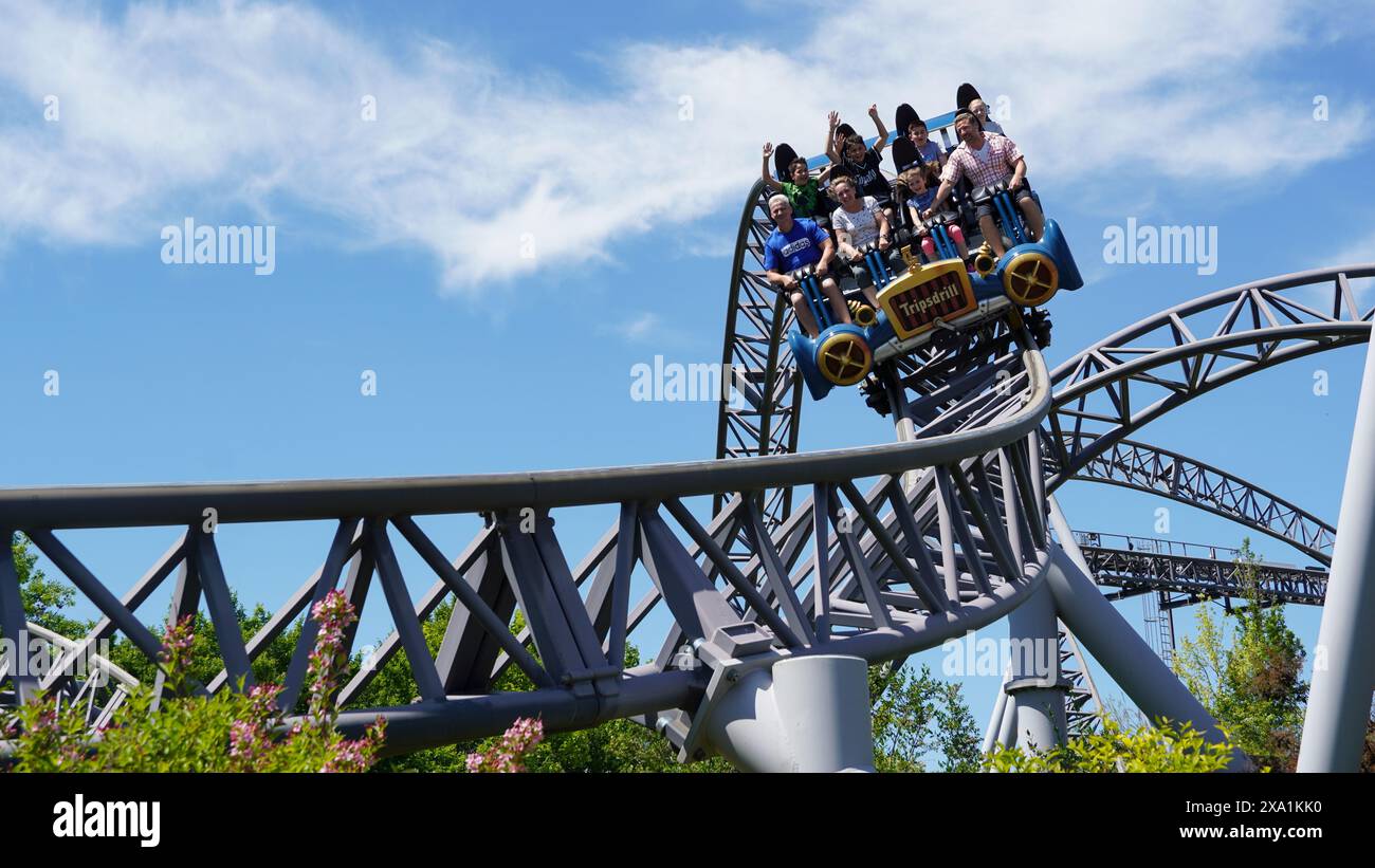 Young people have fun on the Karacho extreme roller coaster at the ...