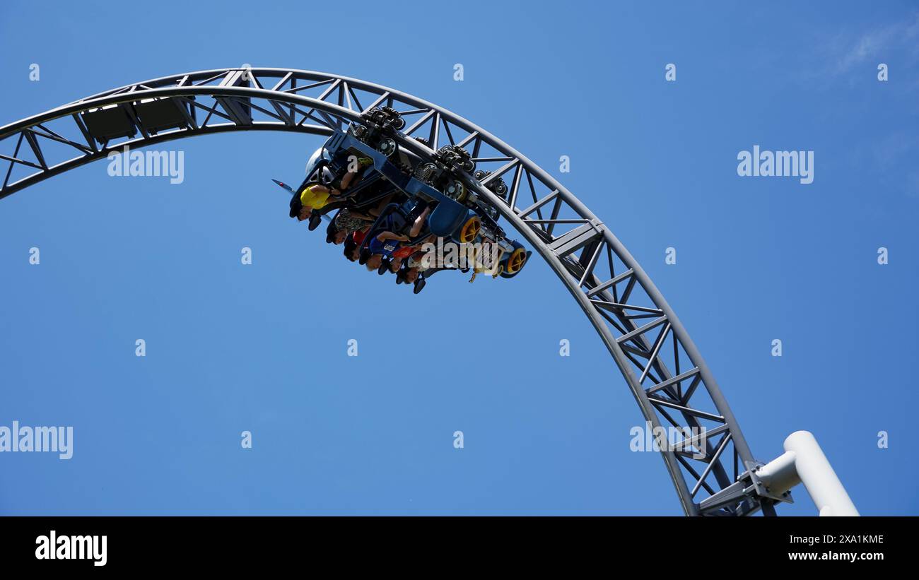 Young people have fun on the Karacho rollercoaster at the Tripsdrill ...