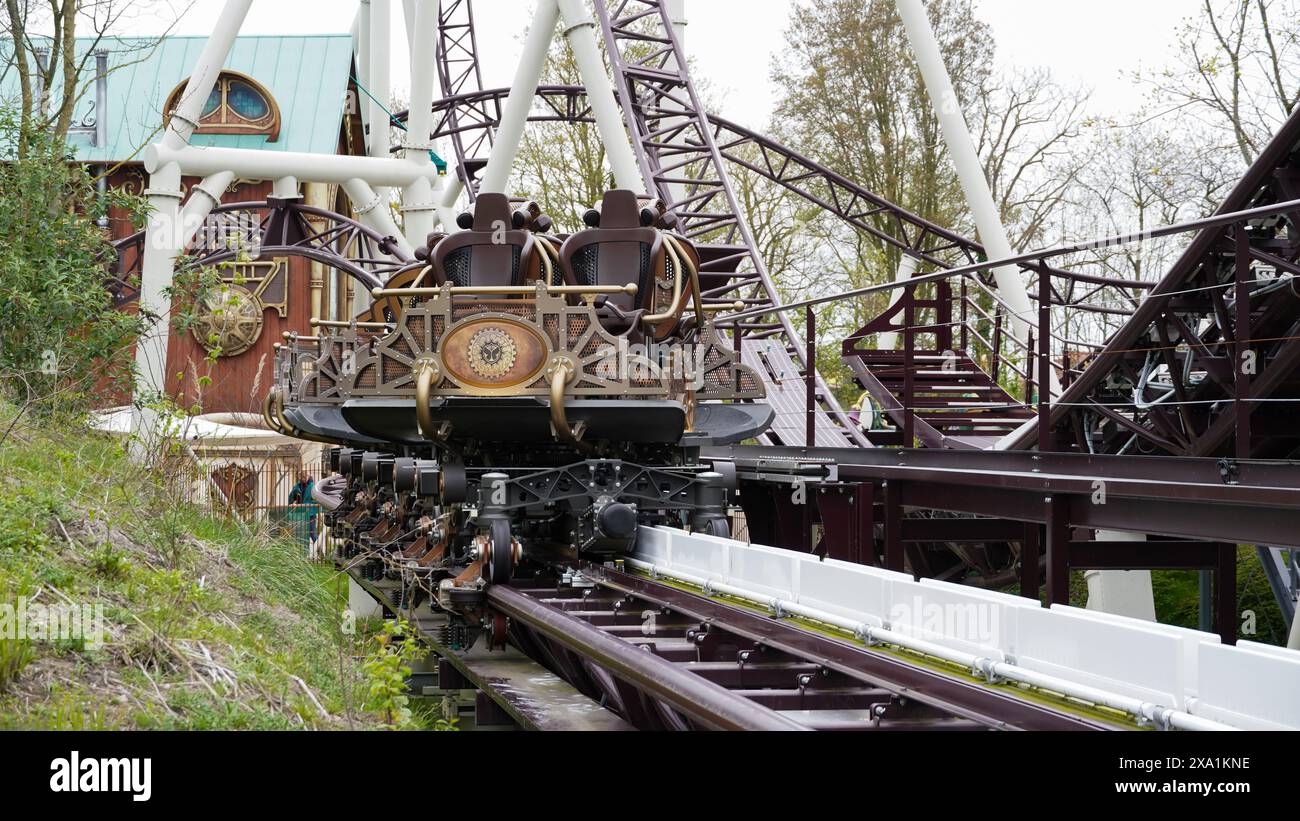 Train of the extreme spinning roller coaster "The Ride to Happiness ...