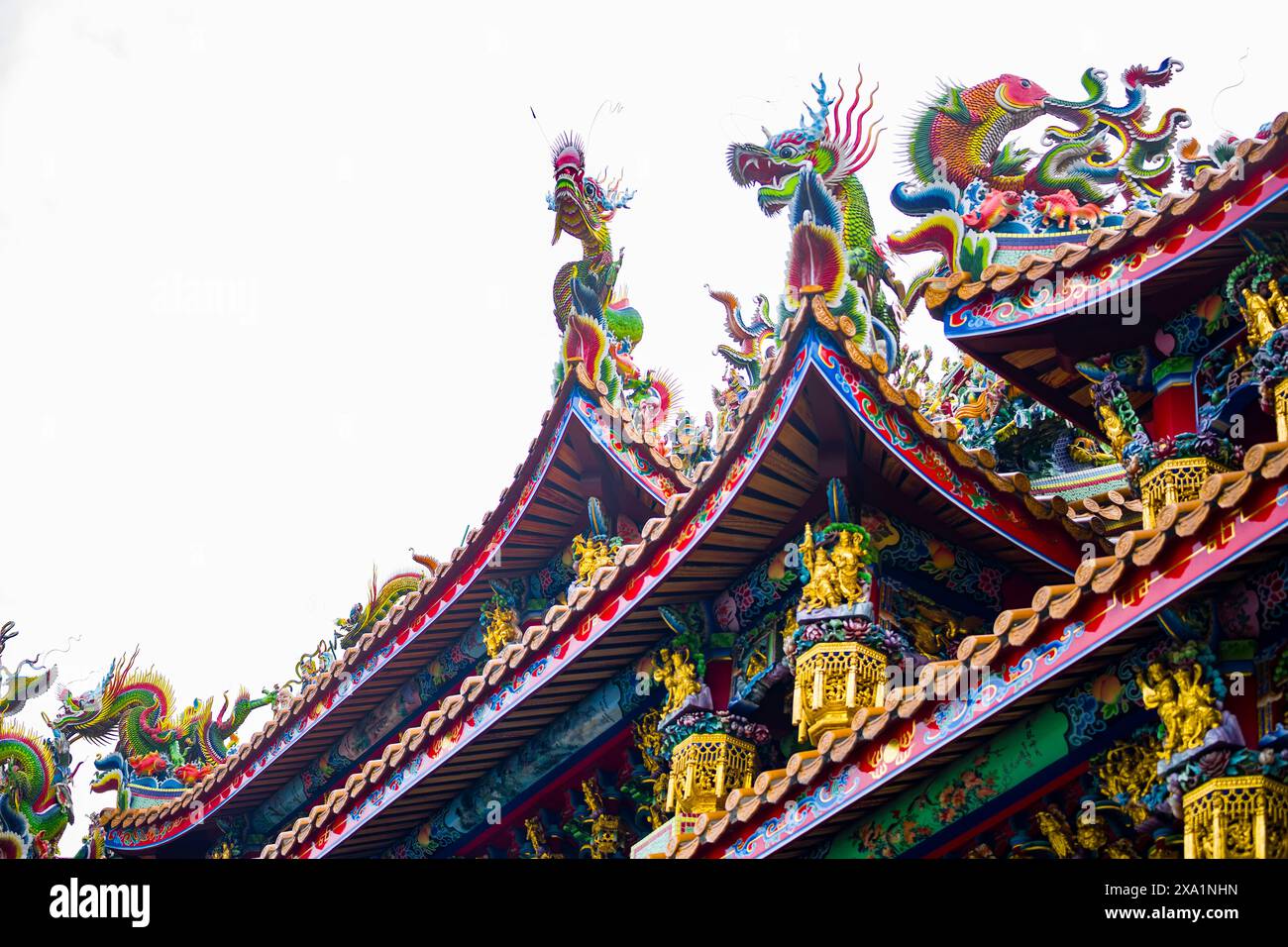 A temple with statues and grand pillars on each side Stock Photo - Alamy