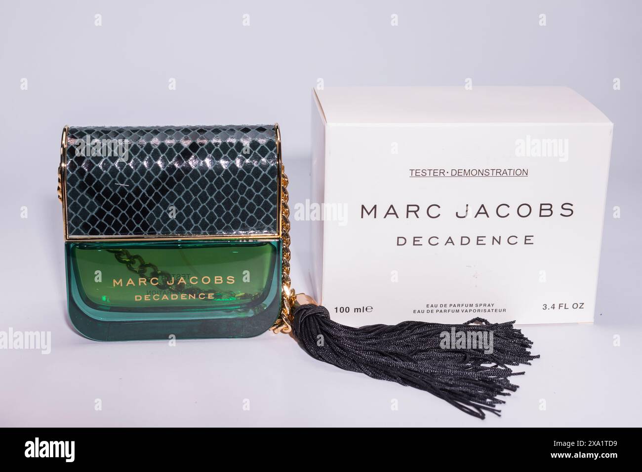 A white box next to a Marc Jacobs Decade perfume bottle Stock Photo - Alamy