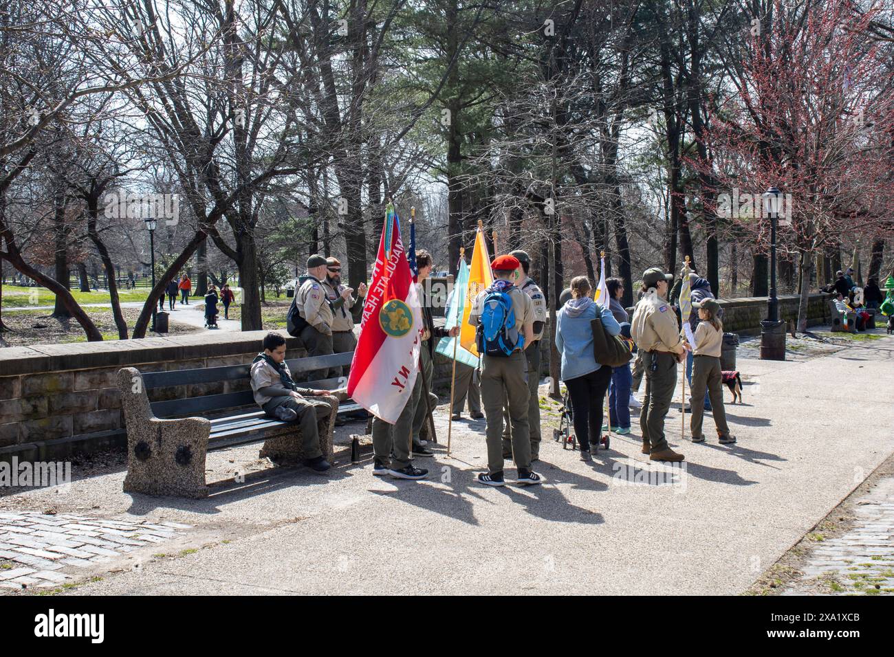 A group of people standing on the sidewalk before the Saint Patrick's ...