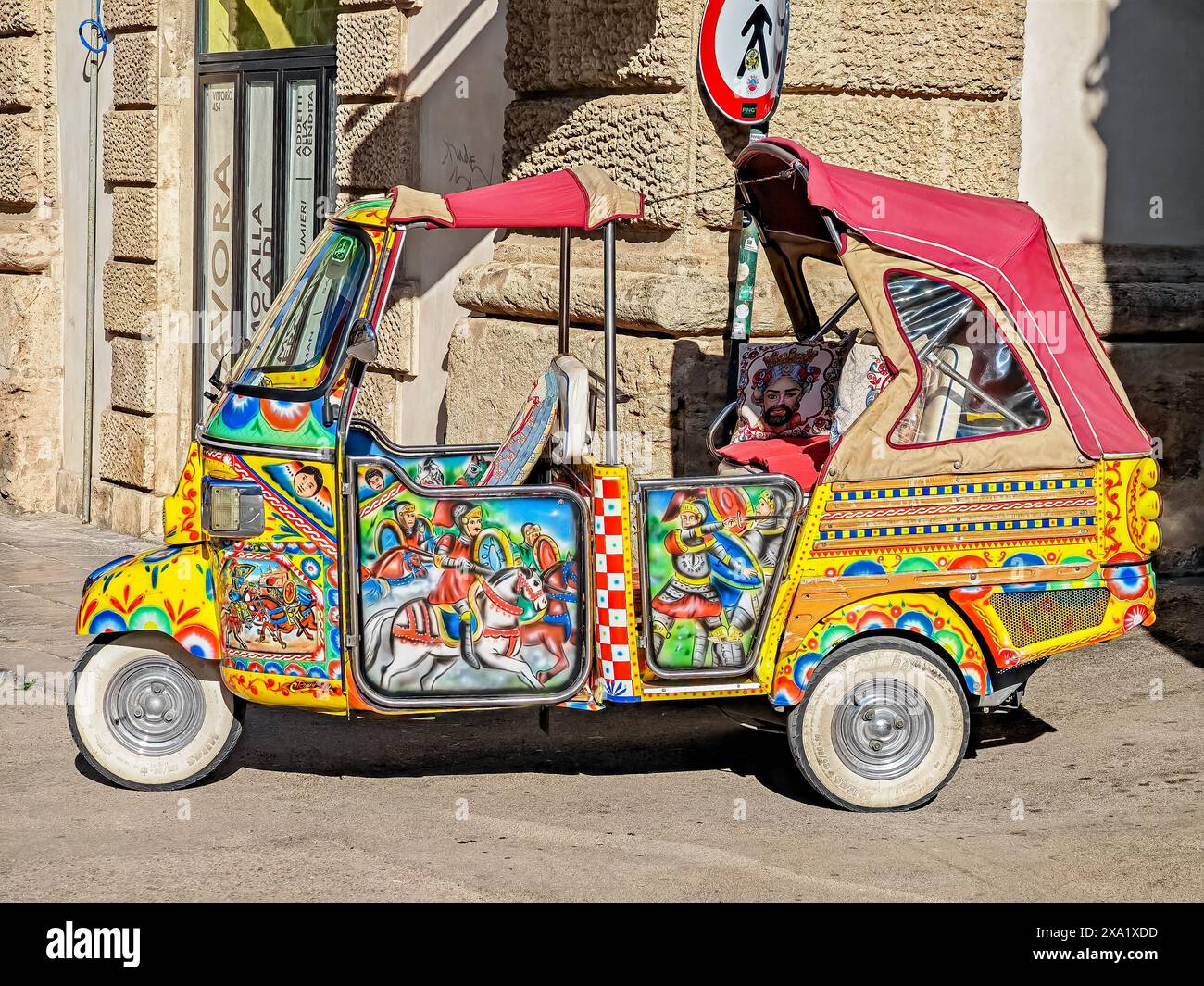 A vibrant car painted in the traditional Sicilian style Stock Photo - Alamy